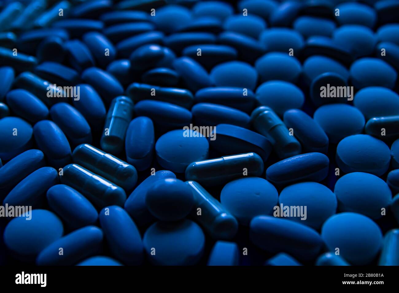 Blue white pills, tablets capsule. Color of the year concept Stock ...