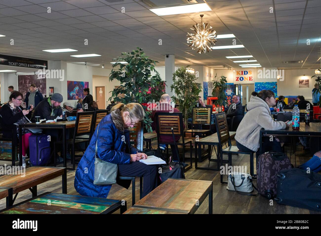 Passengers waiting at a busy Heysham port for the Isle of Man ...