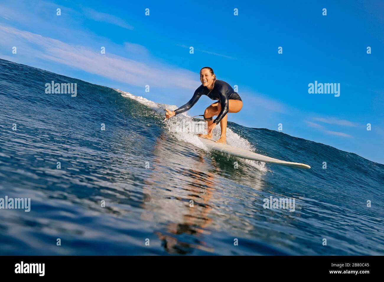 Female surfer standing on hi-res stock photography and images - Alamy