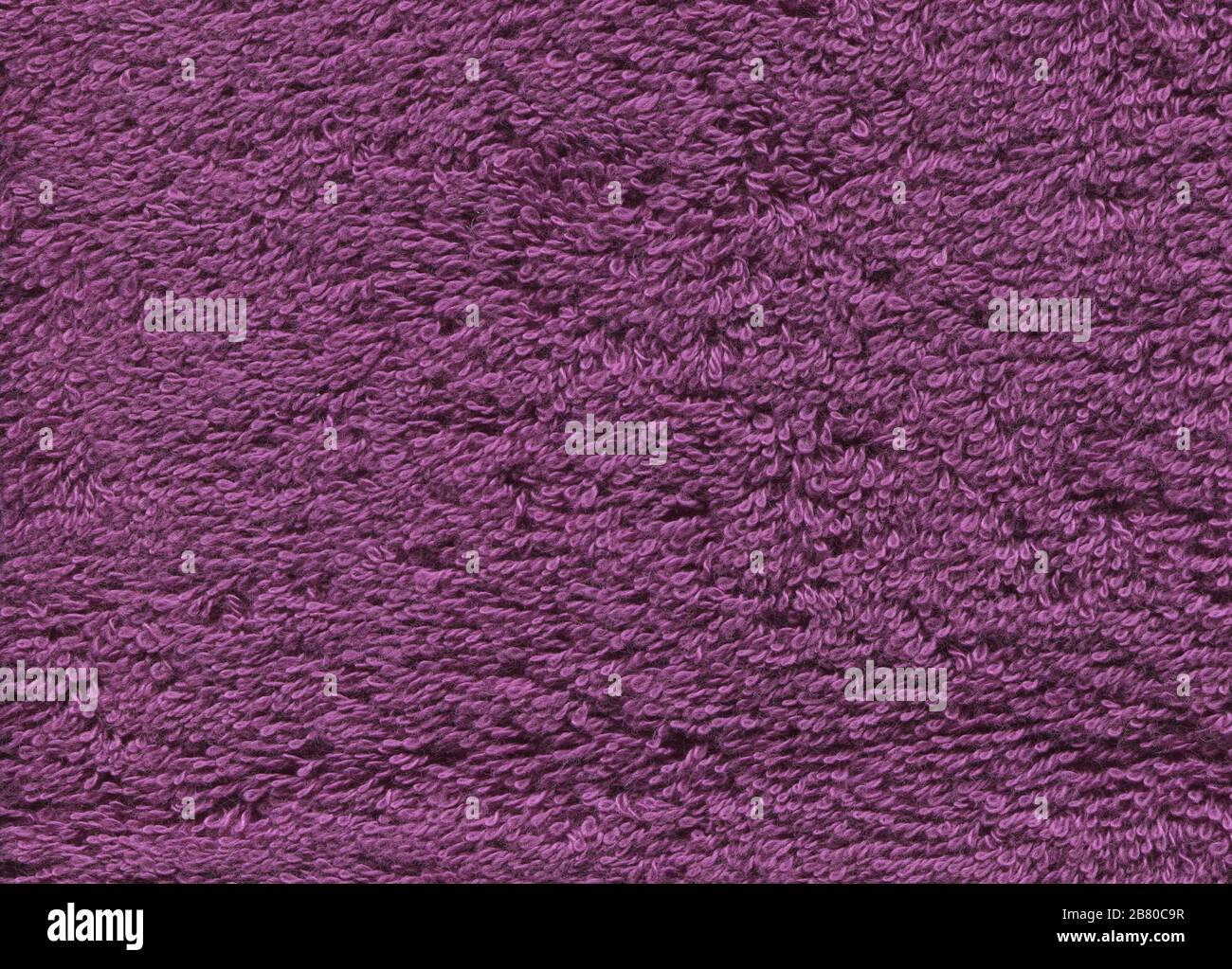 Violet fibers towel texture. Violet bath towel background. Ultra violet ...