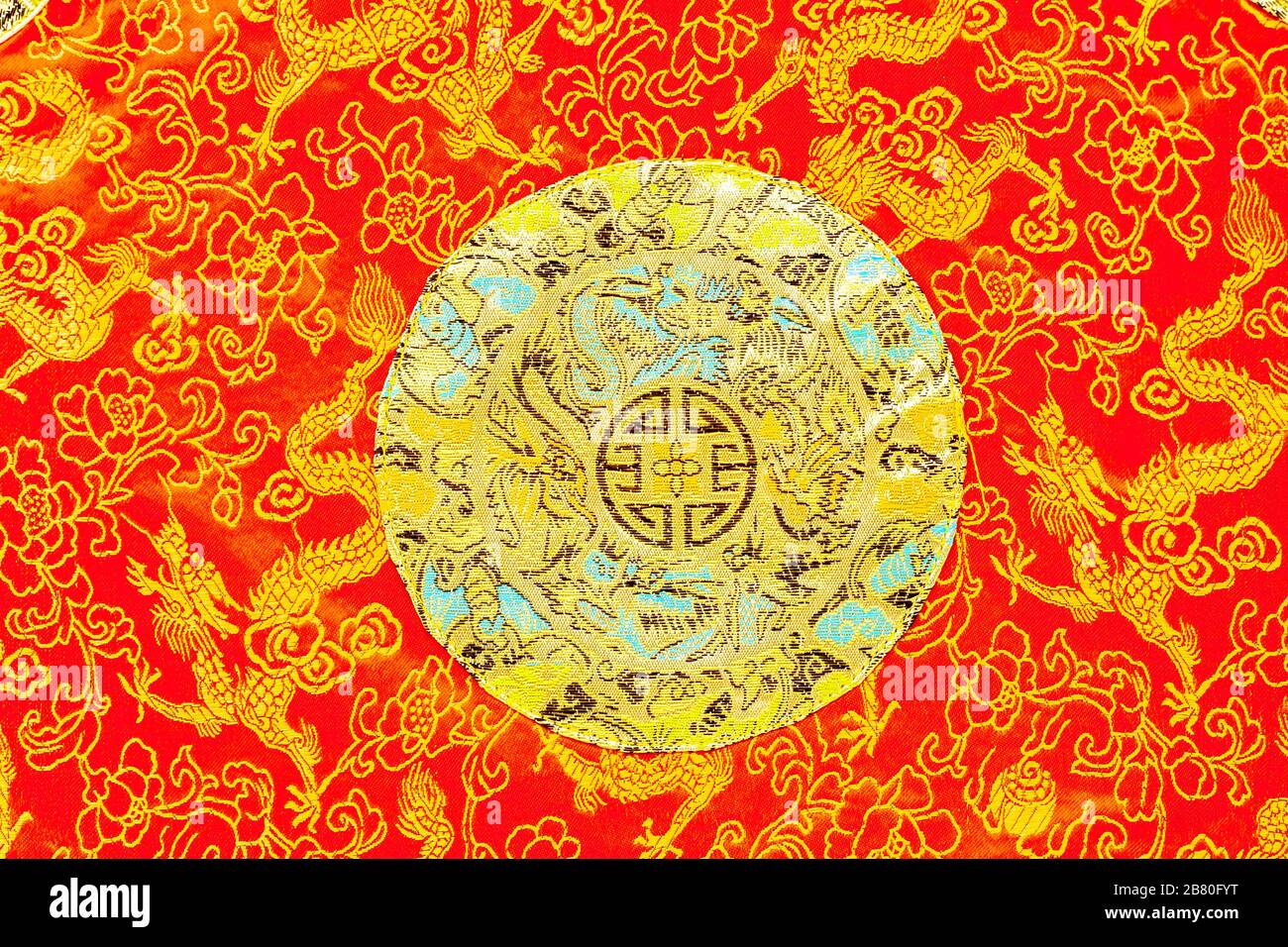 Silk fabric in yellow and red with traditional Chinese motifs Stock ...