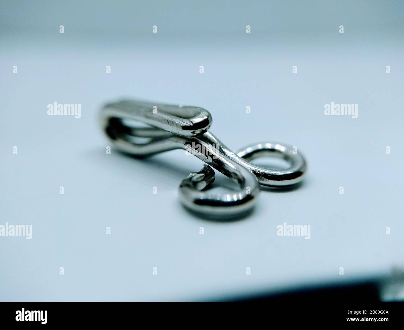 A picture of cloth hooks Stock Photo - Alamy