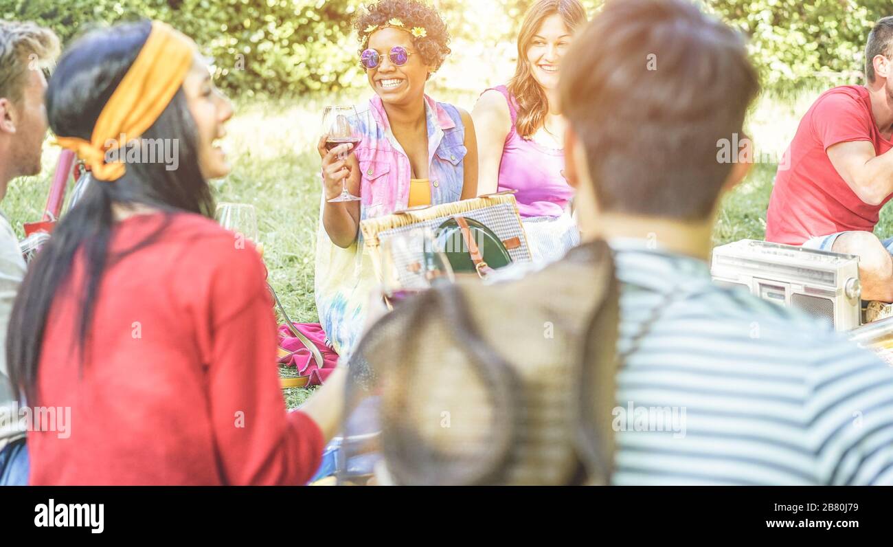 Happy friends making picnic lunch outdoor - Young people having fun ...