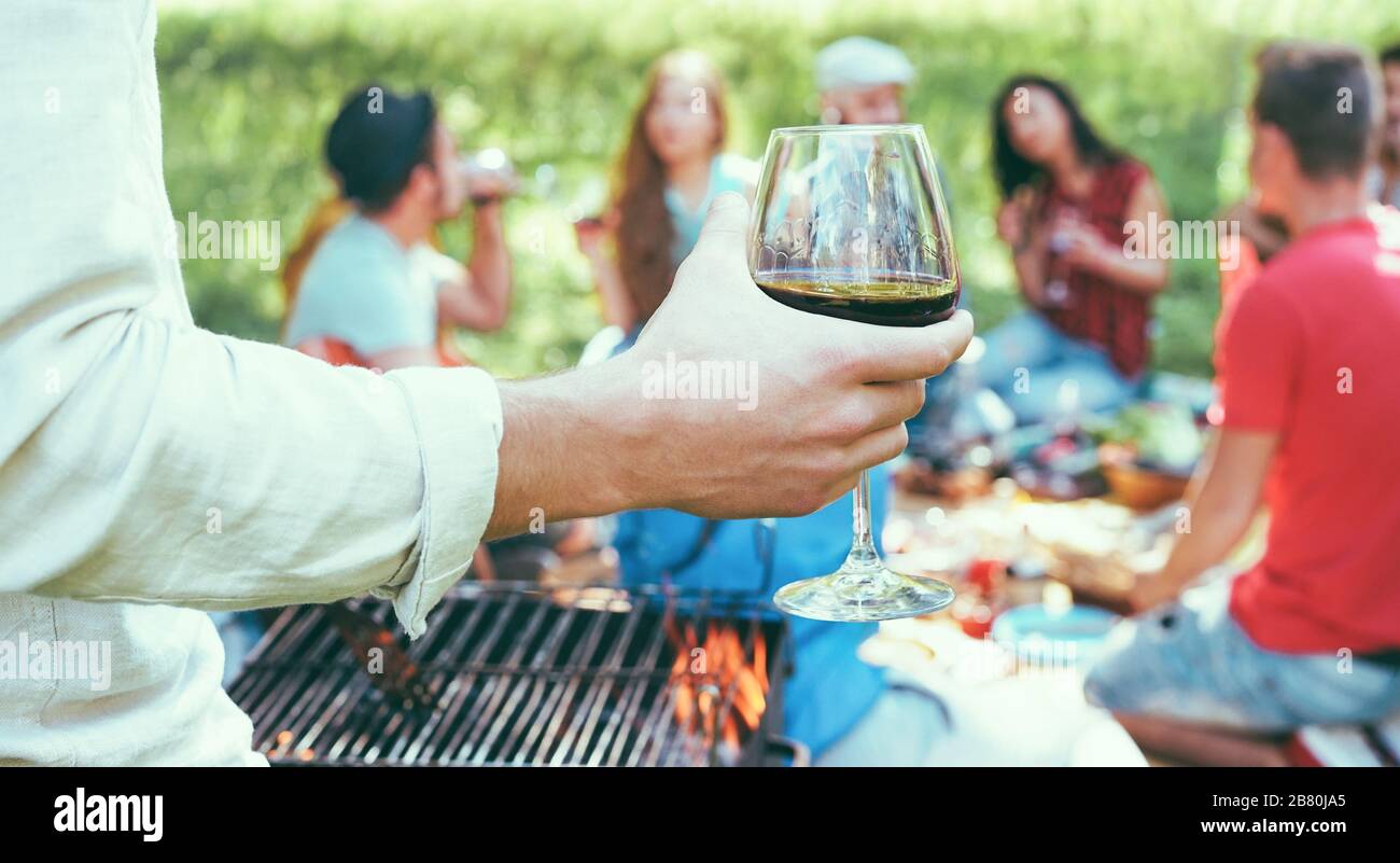 Young friends having barbecue picnic in nature - Group of people ...