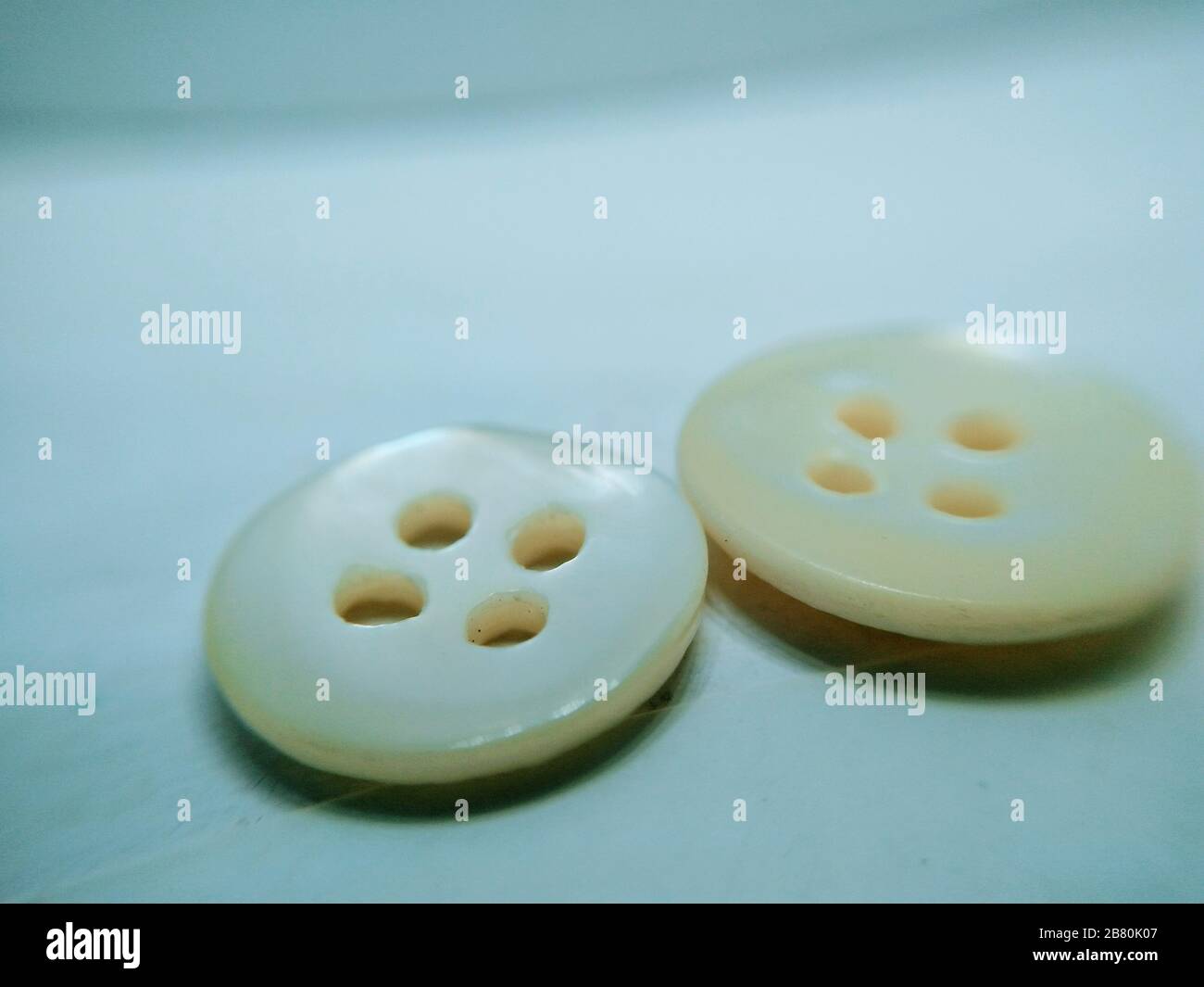 A picture of cloth hooks Stock Photo - Alamy