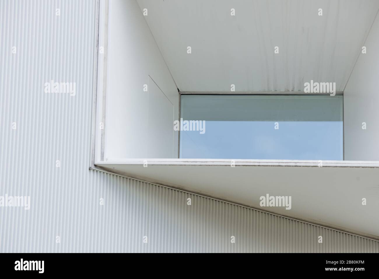 One window on a white wall Stock Photo - Alamy