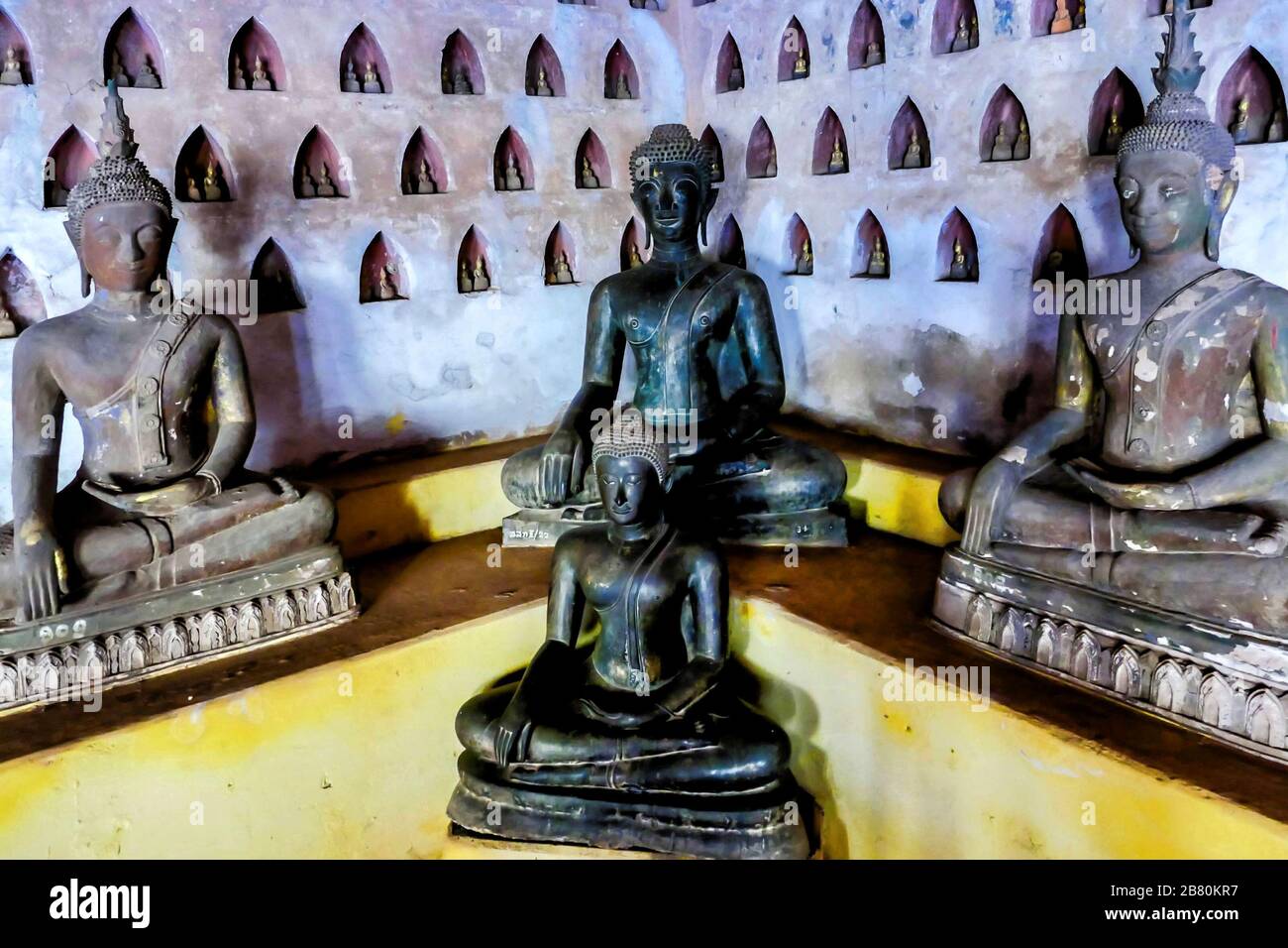 Beautiful Asian stone statues inside a historic building Stock Photo ...