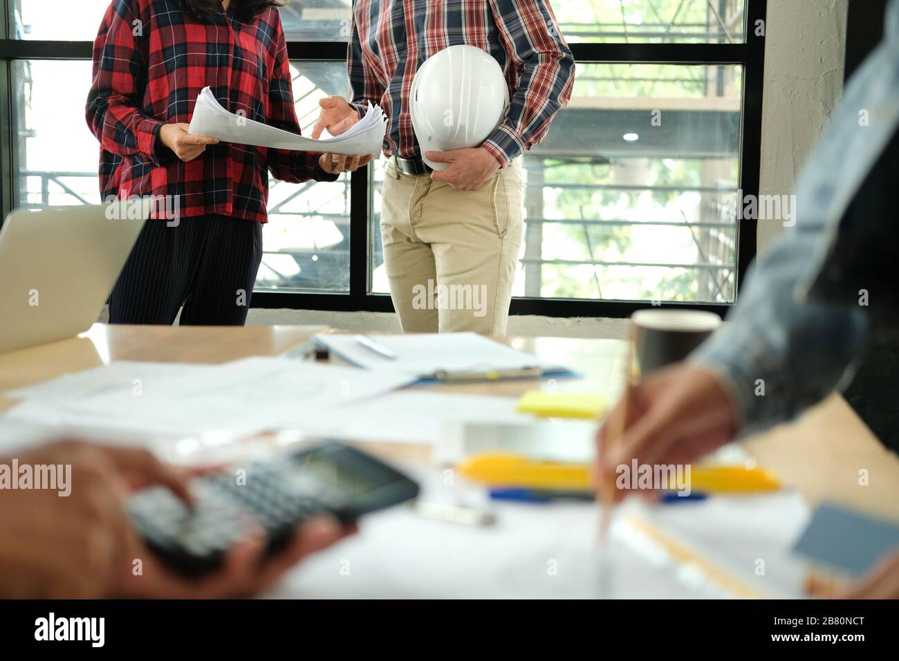 architect engineer interior designer team working discussing on house ...