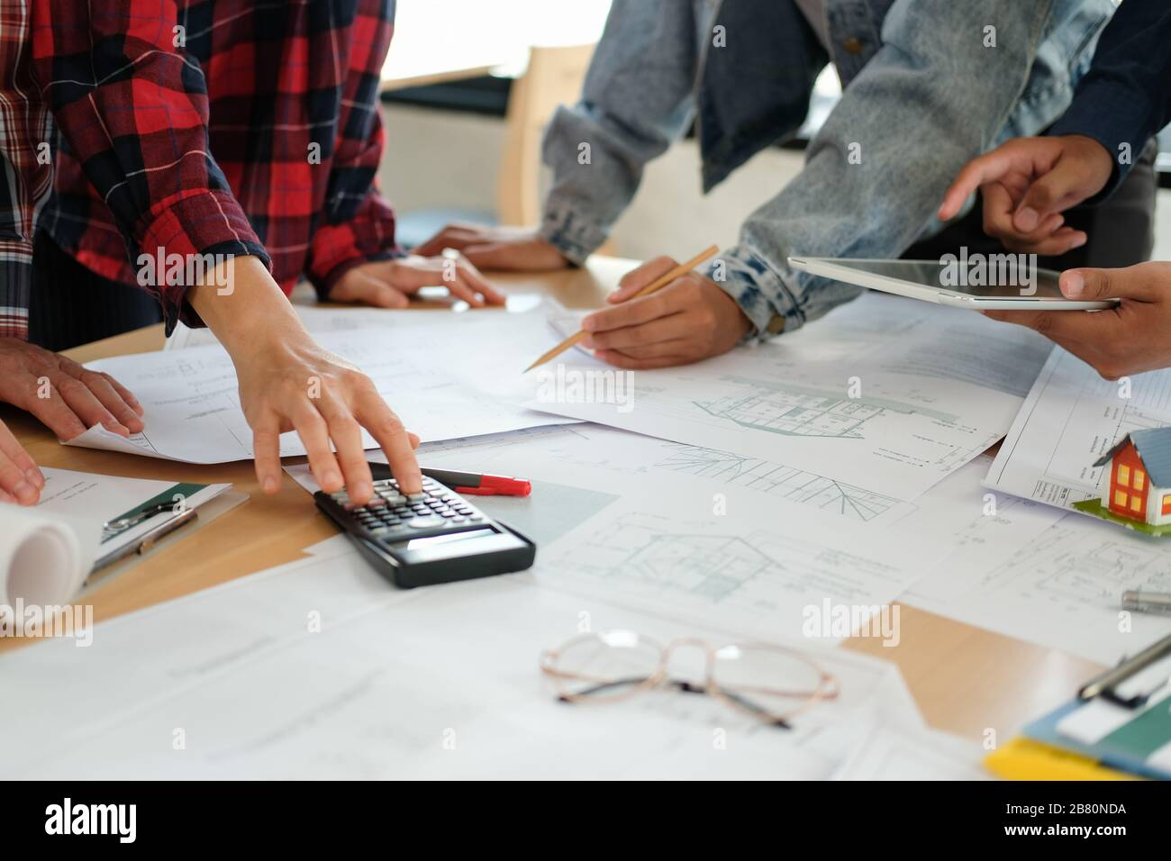 architect engineer interior designer team working discussing on house ...