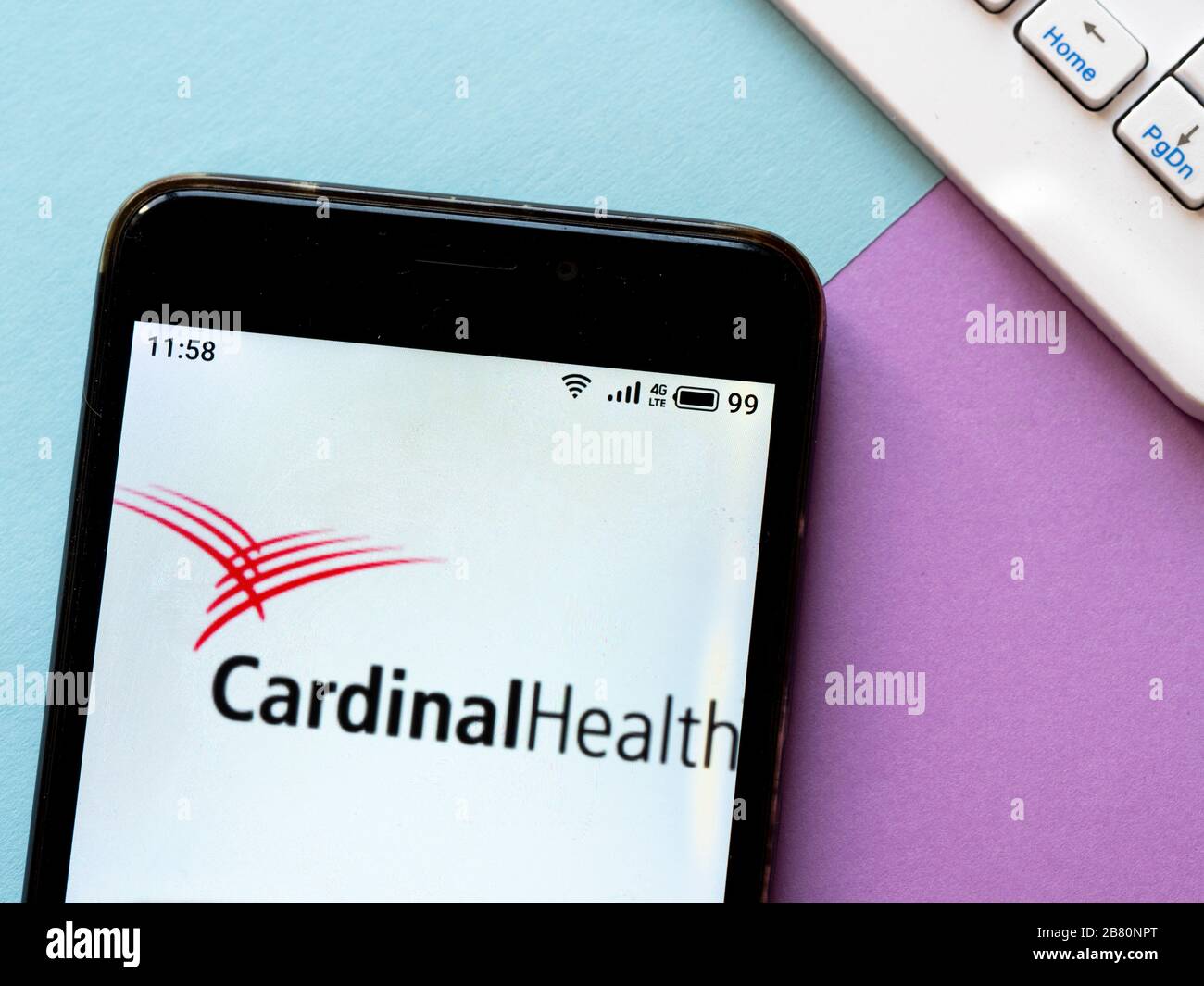 In this photo illustration Cardinal Health logo is seen displayed on a ...