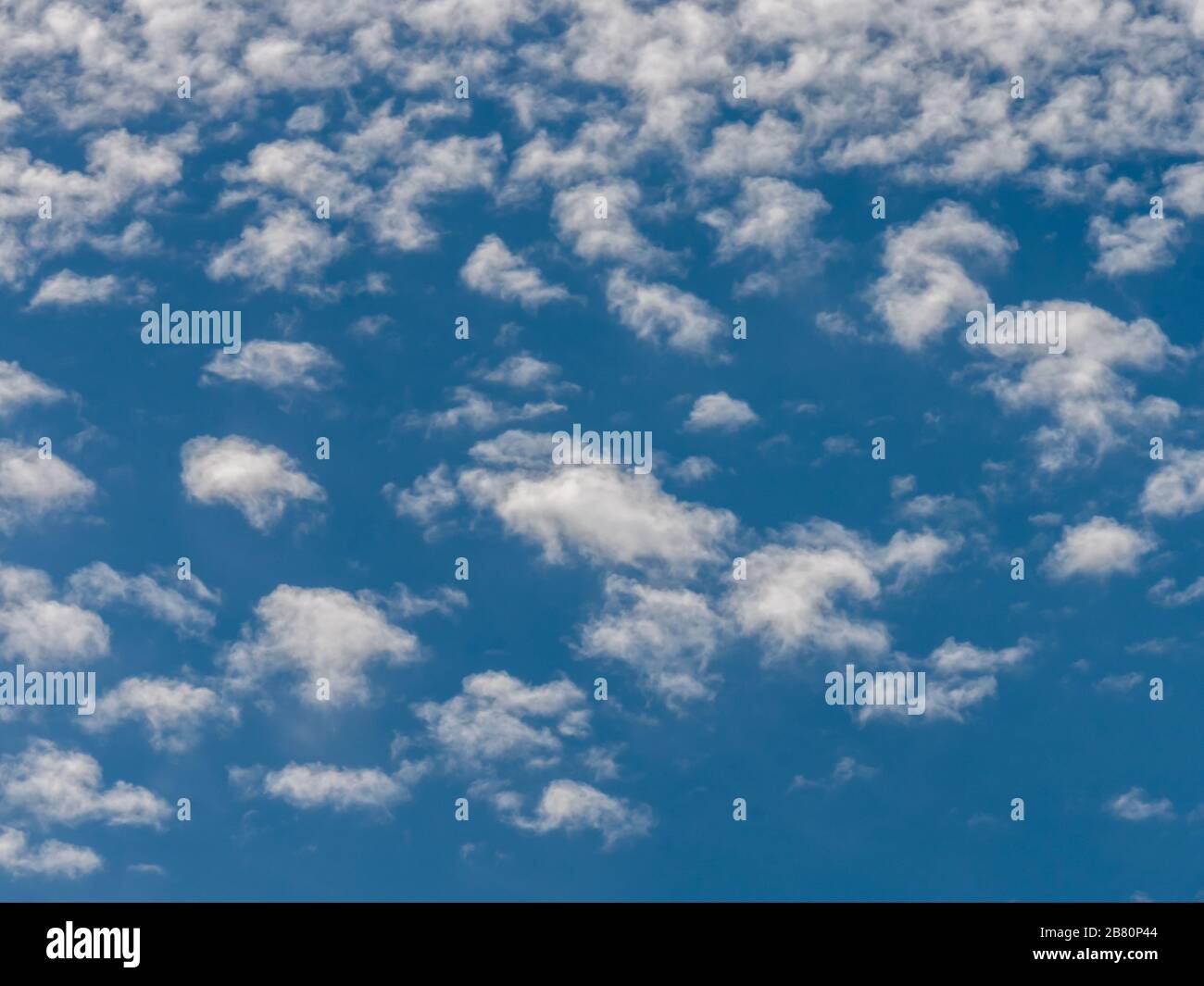 Blue sky background with white clouds. Nature Stock Photo - Alamy