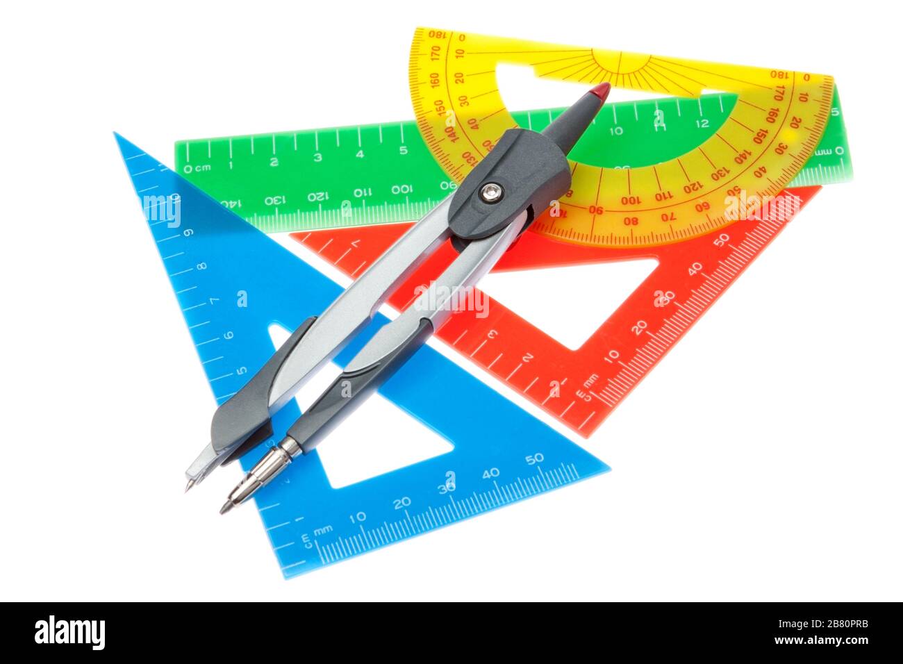 A set of rulers for the school and a compass on a white background ...