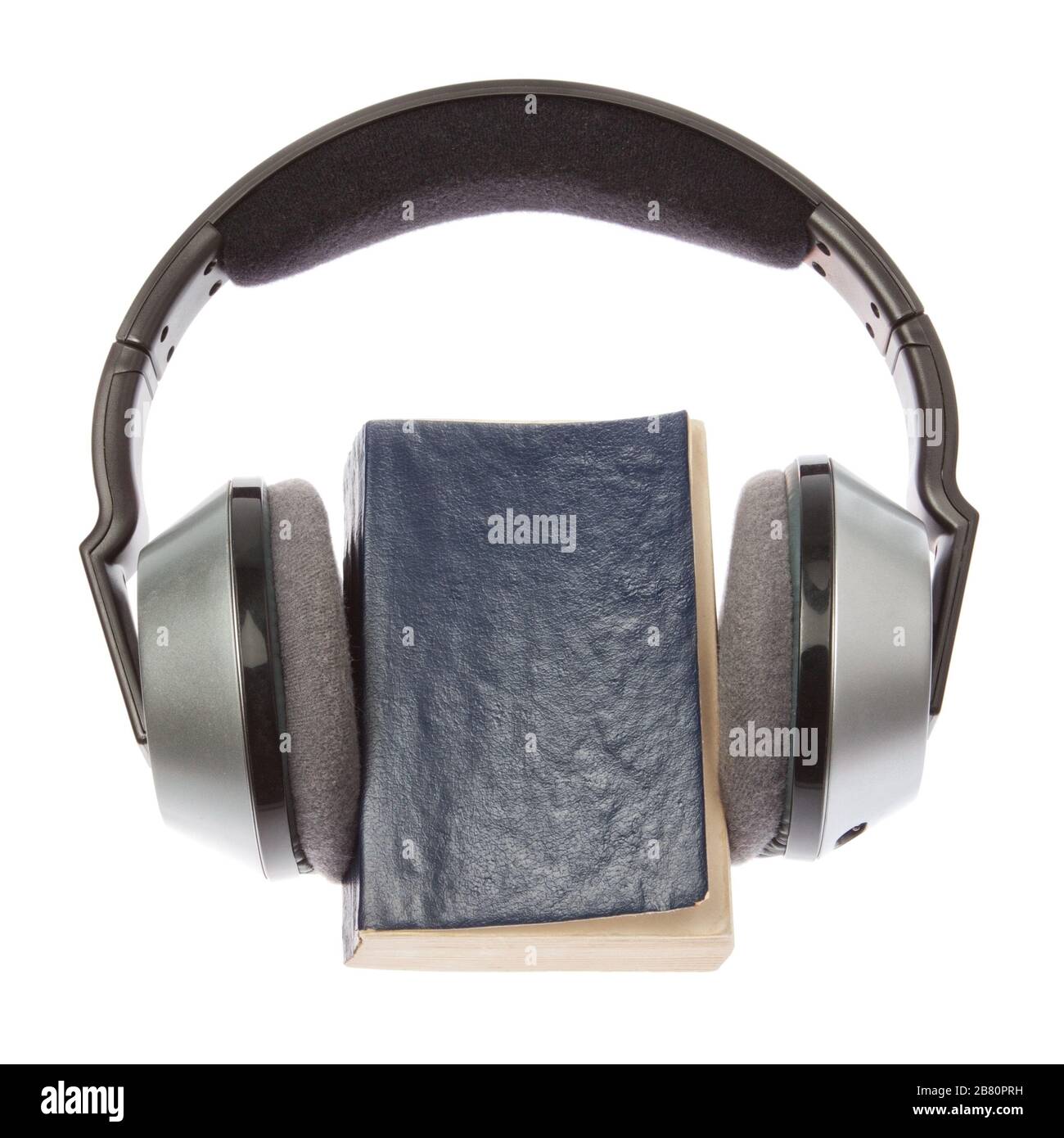 Wireless headphones and a book. On a white background Stock Photo - Alamy