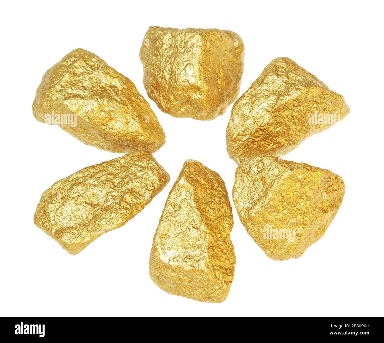 Gold bullion nuggets. On a white background Stock Photo - Alamy