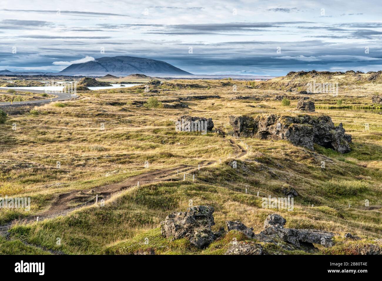 tranquil landscape with solitary lava monoliths at Lake Myvatn in ...