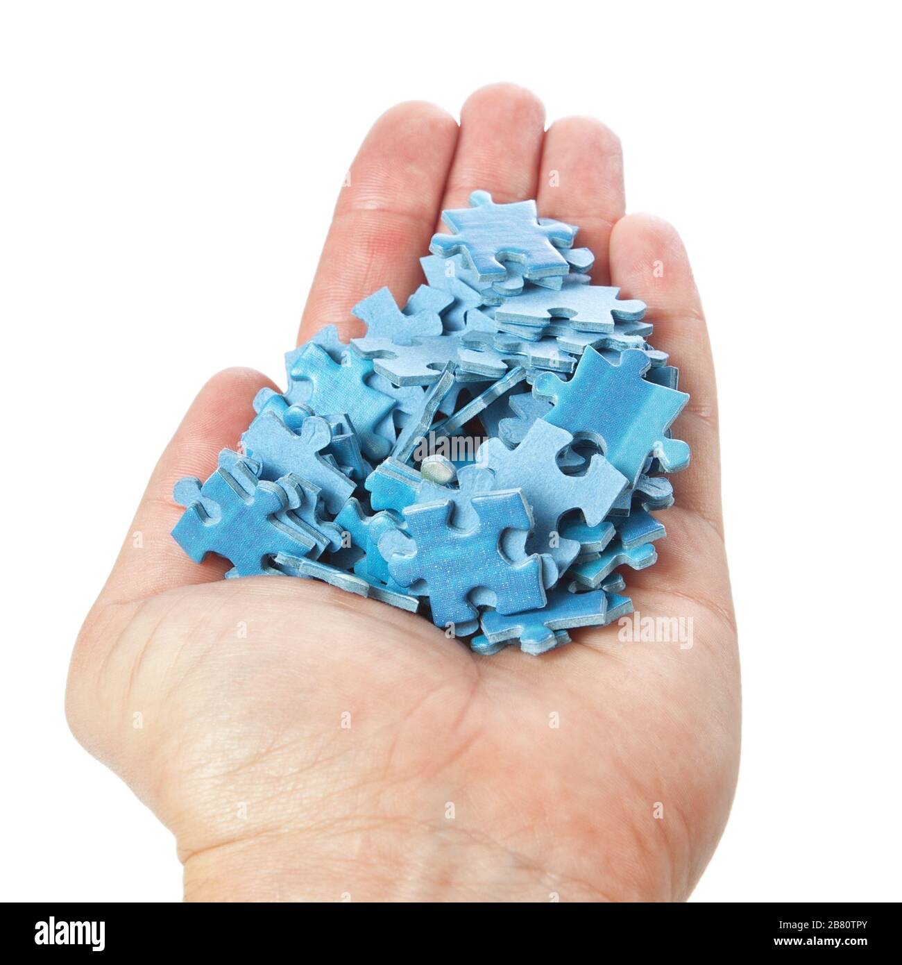 A stack of puzzles palm on a white background Stock Photo - Alamy