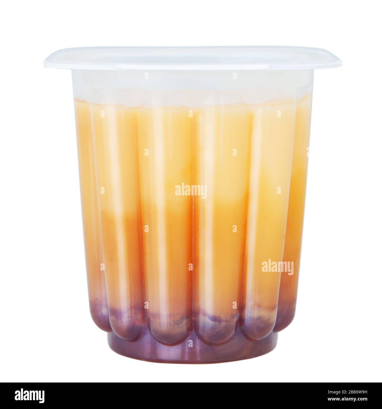 Packaging yogurt pudding on a white background. Closeup Stock Photo - Alamy