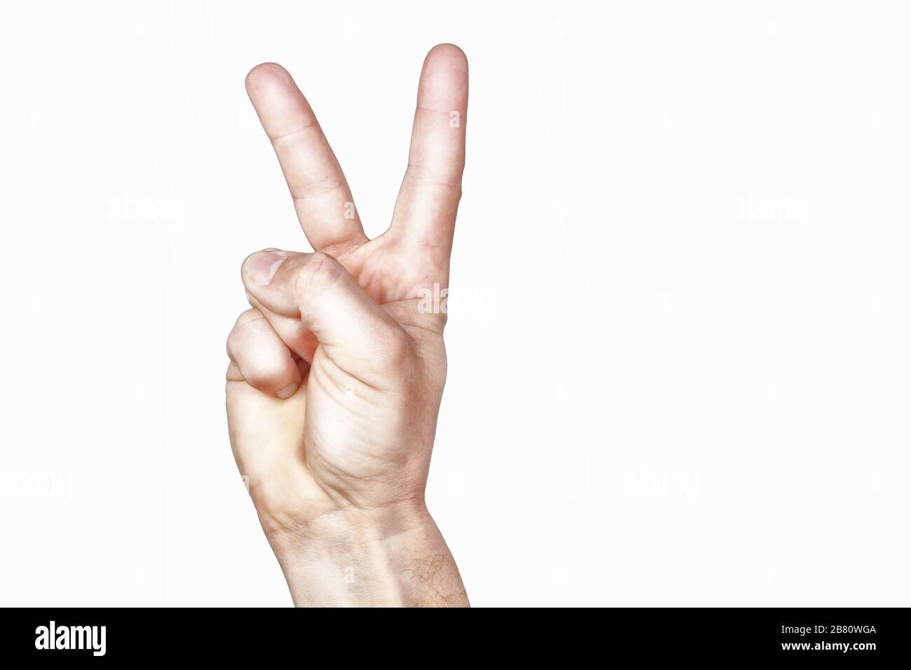 Two fingers in the victory. On a white background Stock Photo - Alamy