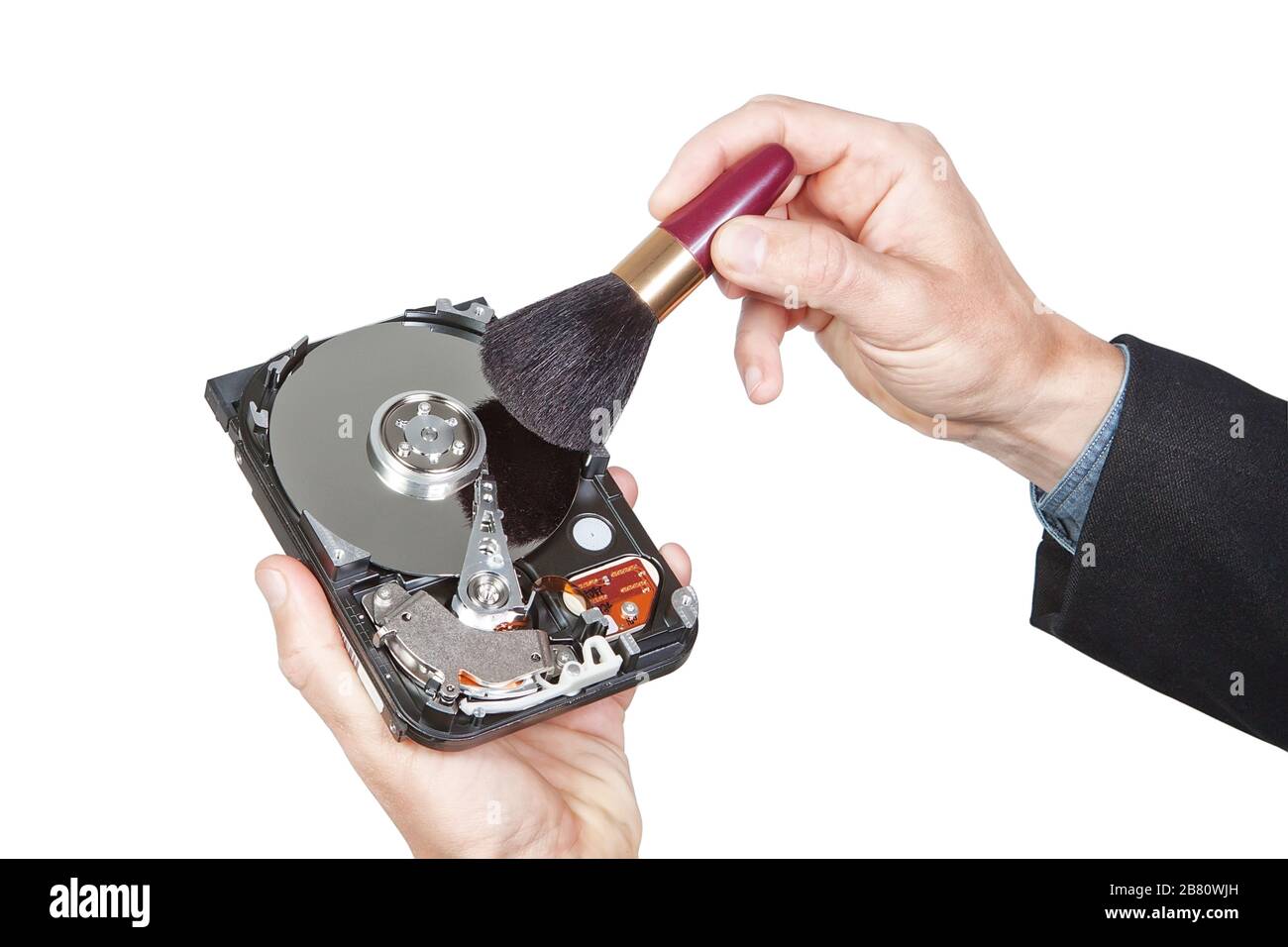 Cleaning open hard disk with brush.On a white background Stock Photo ...