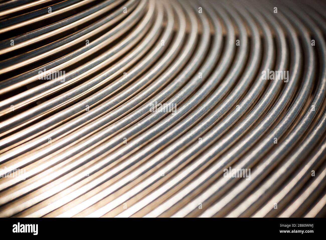 Close-up metal pipes arranged parallel to each other on a street ...