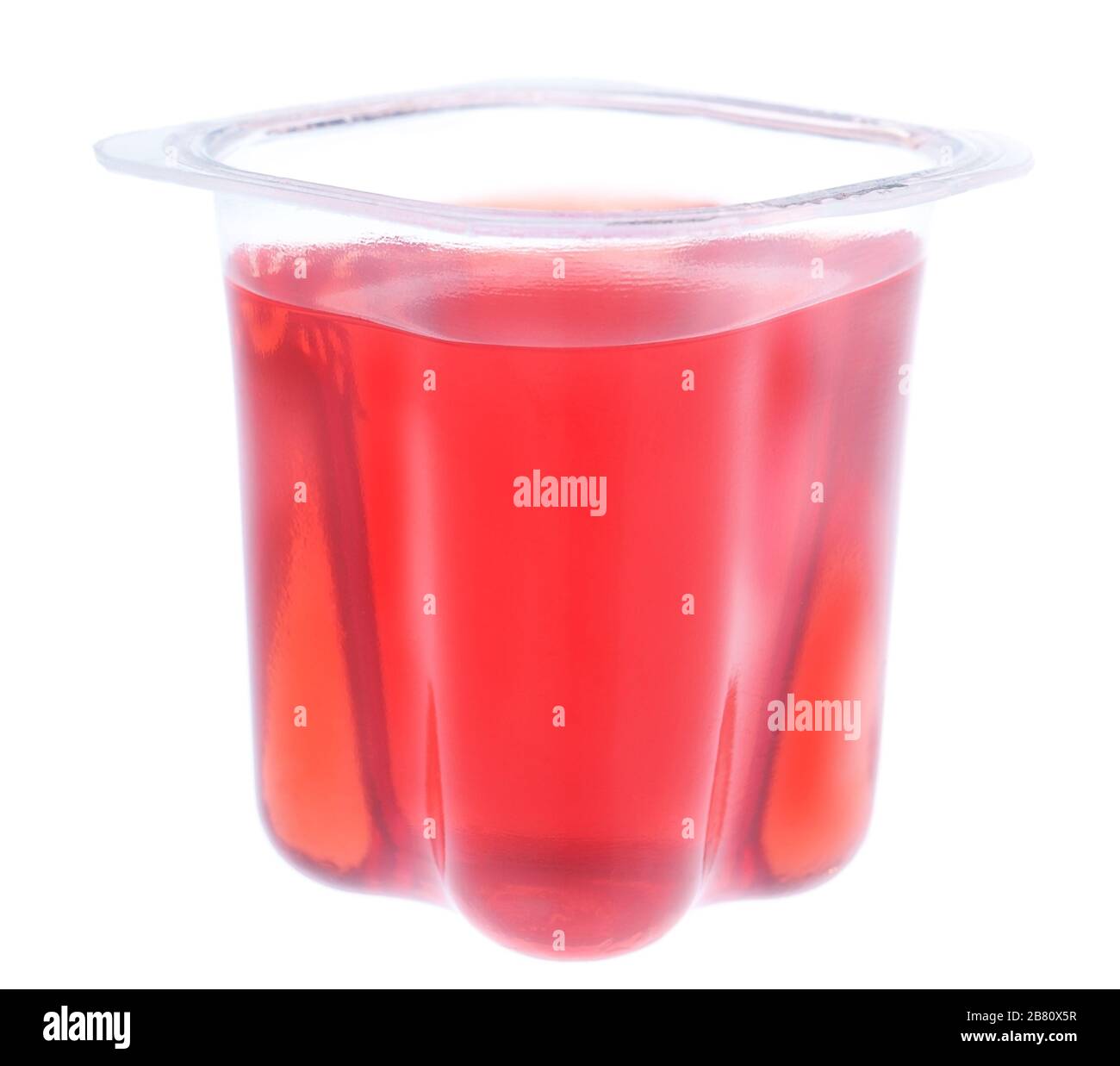 Red gelatin in a plastic yogurt cup. On a white background Stock Photo ...