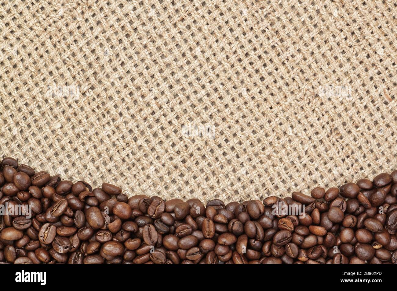 Frame background of coffee beans on bagging texture Stock Photo - Alamy