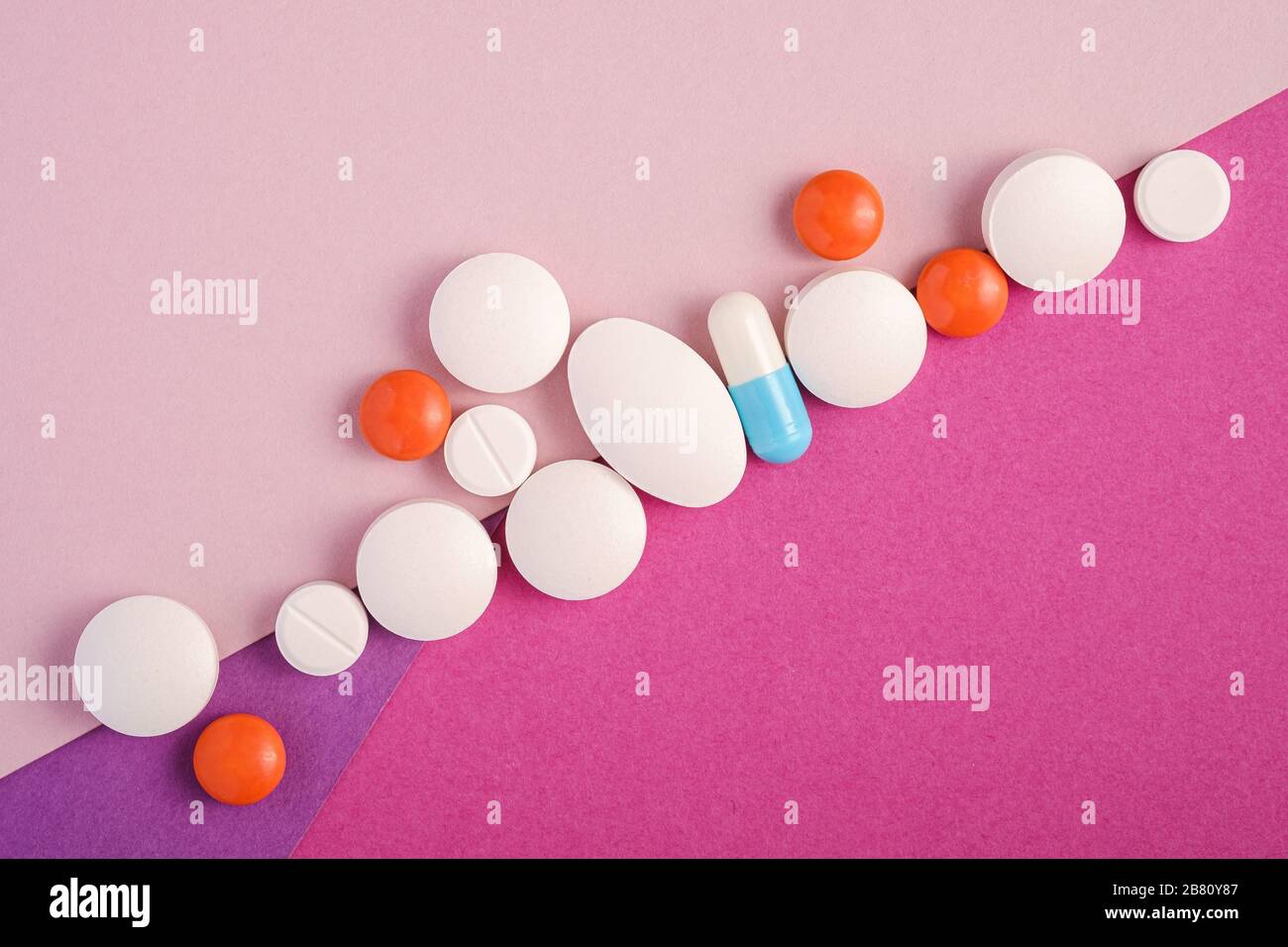 Vitamin tablets pink blue hi-res stock photography and images - Alamy