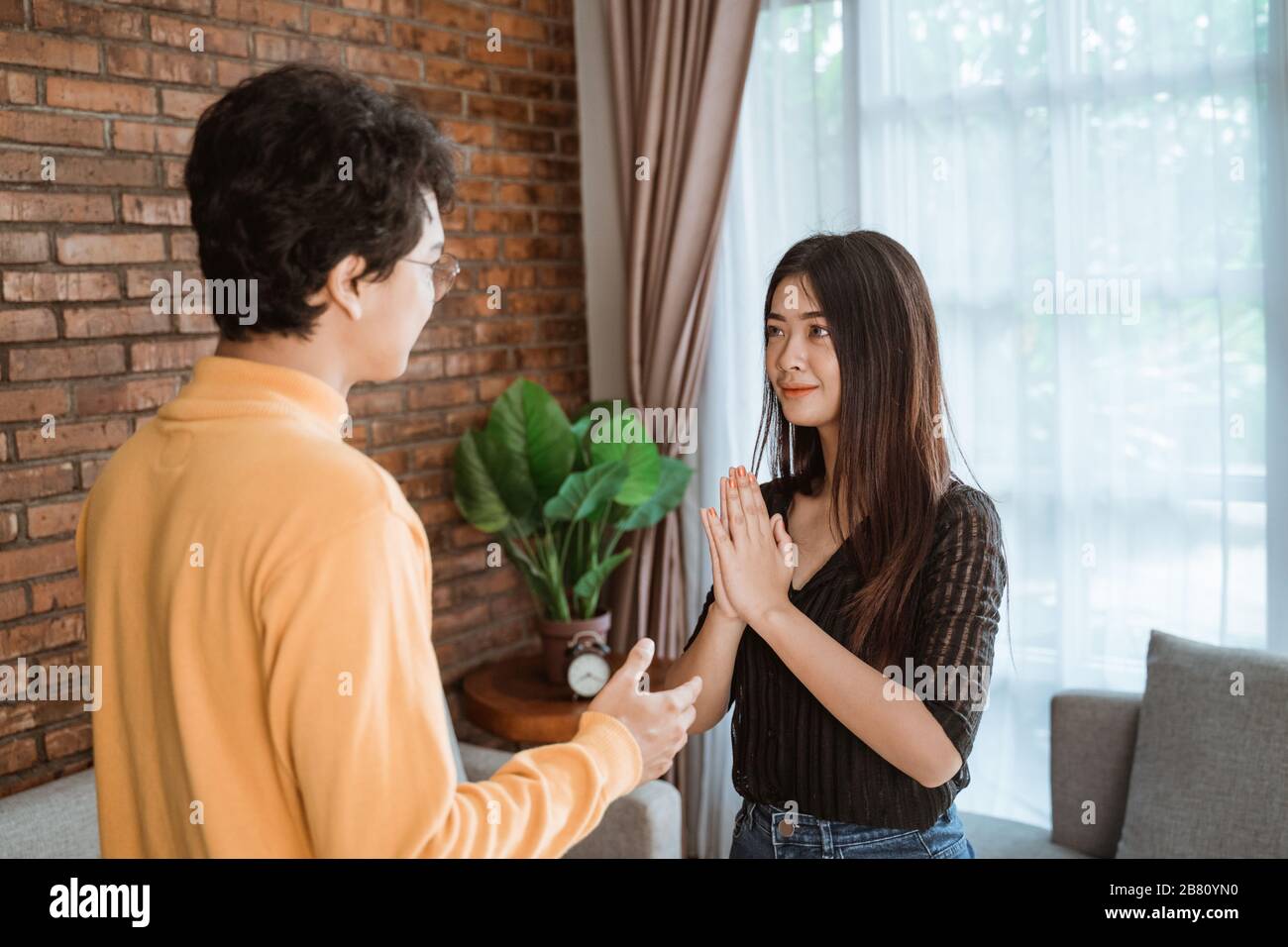 beautiful asian woman refuse to shake hand Stock Photo - Alamy