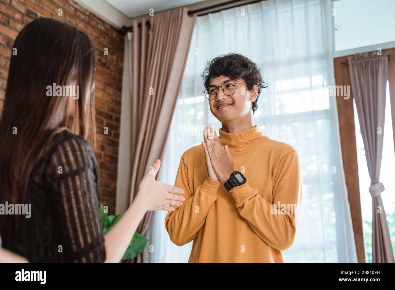 portrait of a male refuse to shake hand on social distancing situation ...