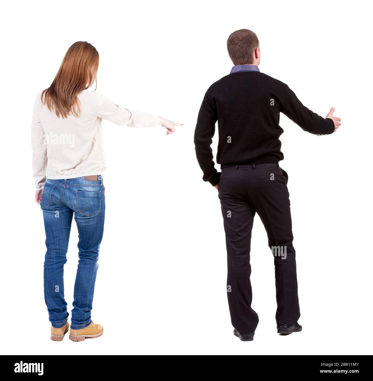 Back view of couple in sweater pointing. Rear view people collection ...