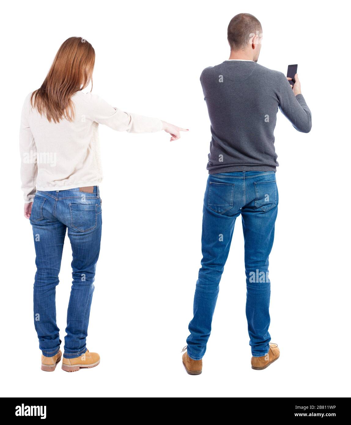 Back view of couple in sweater pointing. Rear view people collection ...