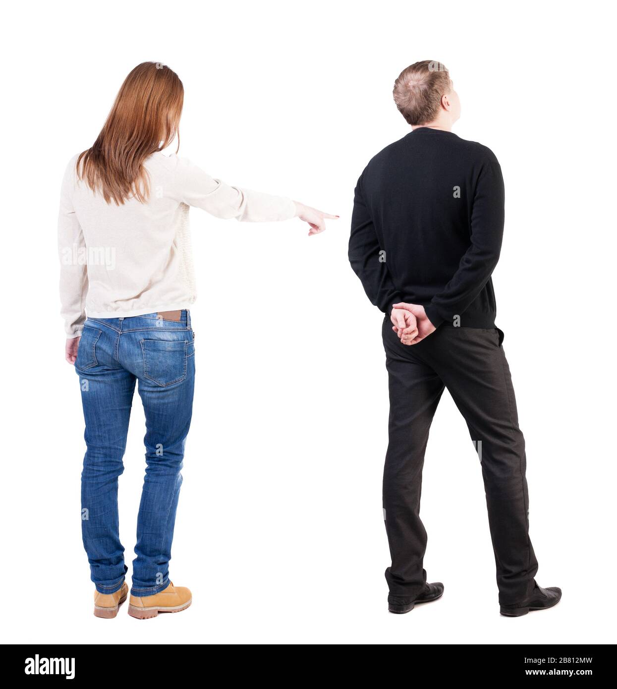 Back view of couple in sweater pointing. Rear view people collection ...