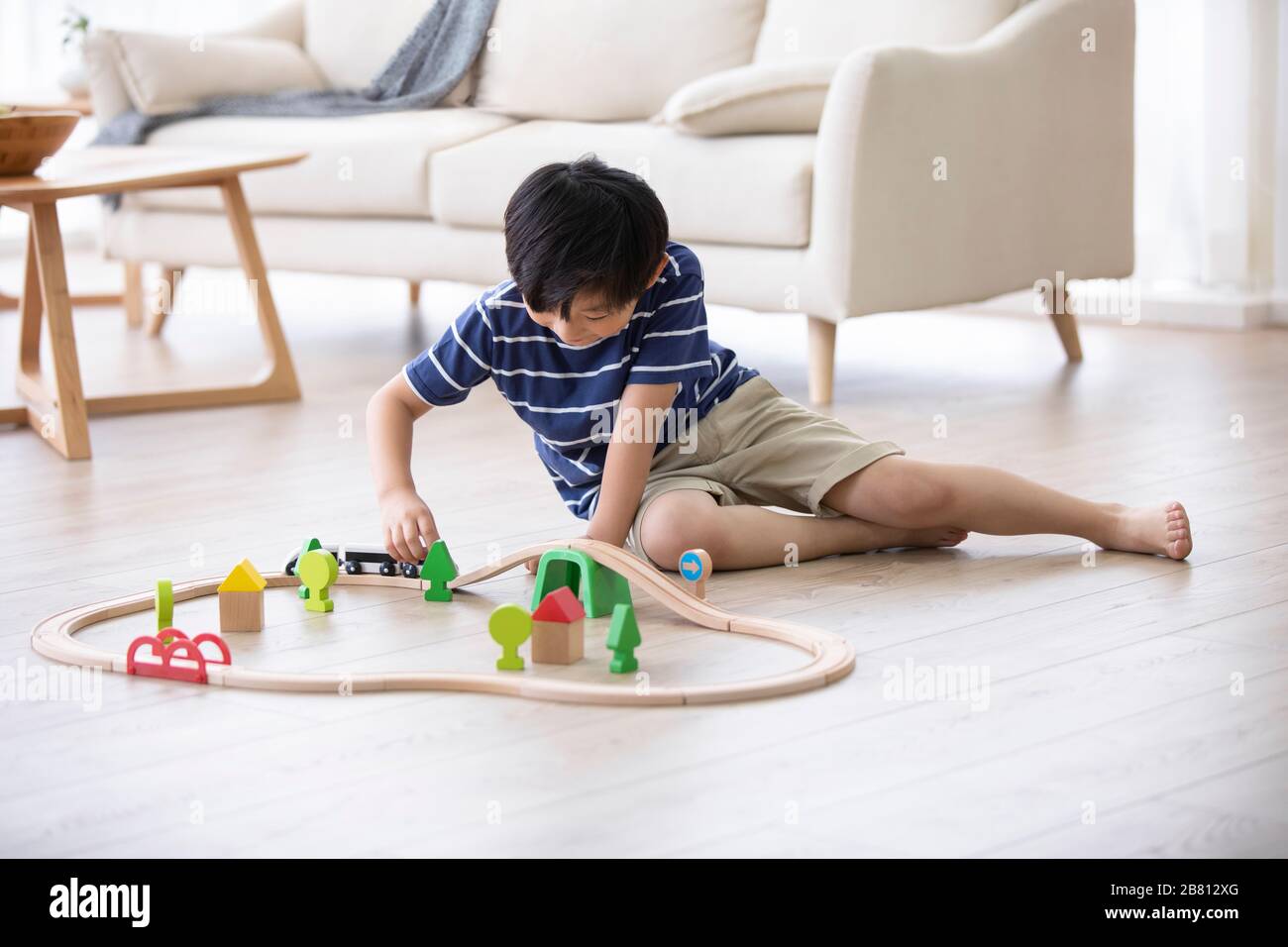 Barefoot chinese boy hi-res stock photography and images - Alamy