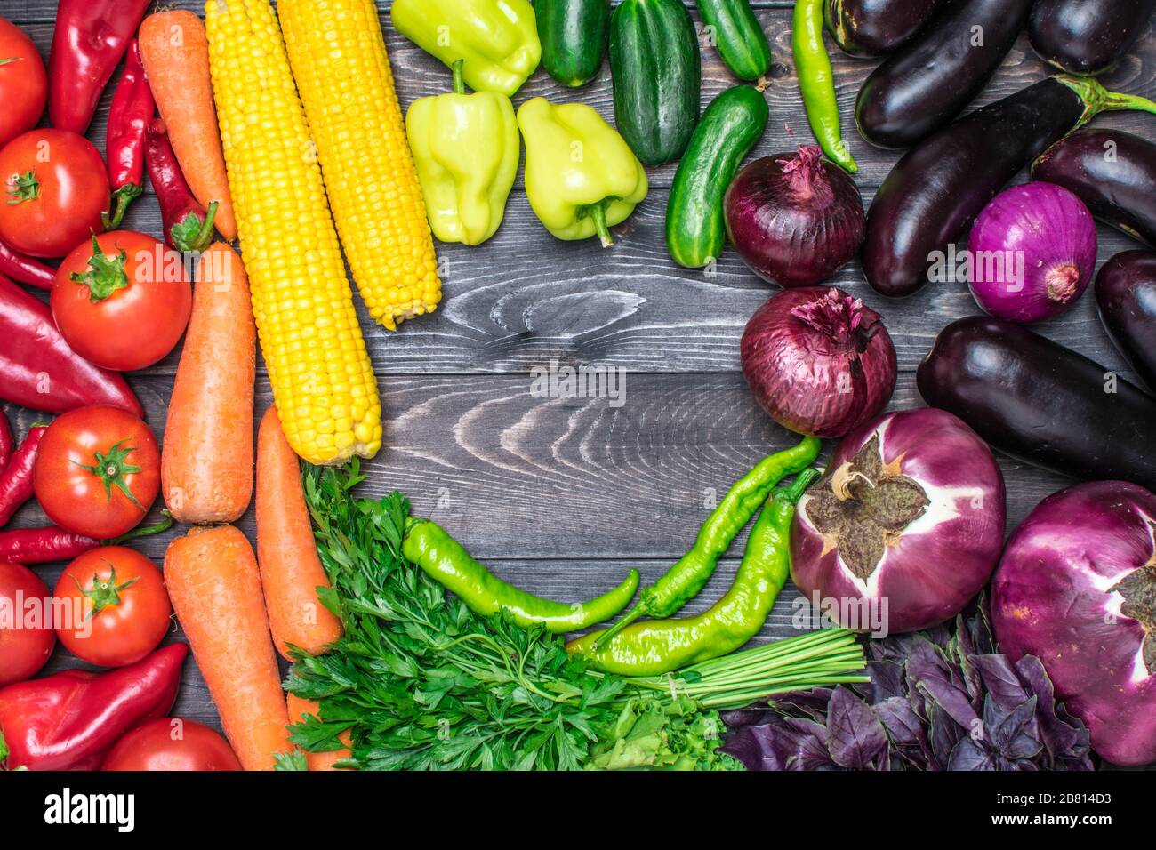 tabletop arrangement of a variety of fresh fruits and vegetables sorted ...