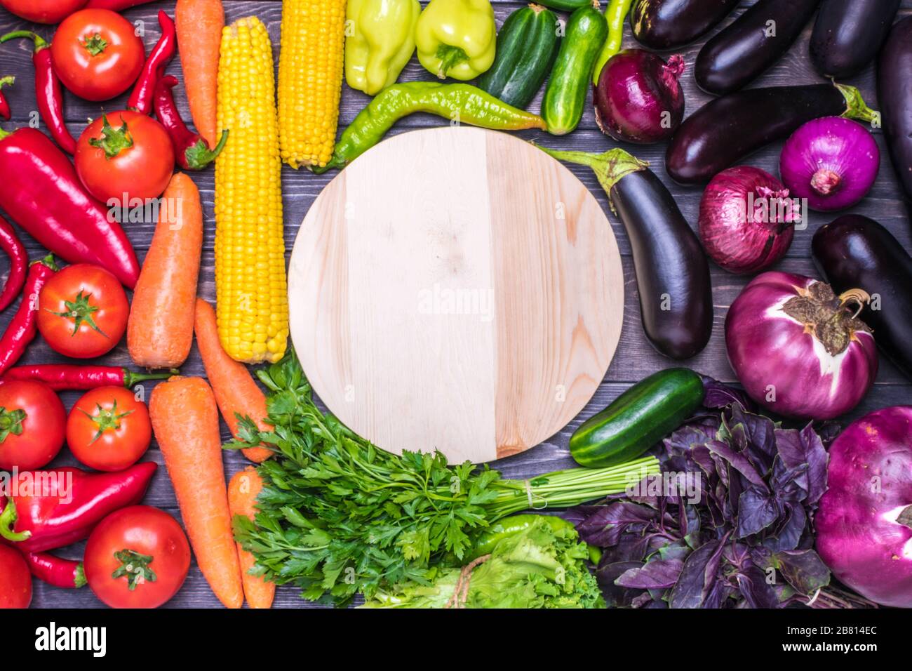 tabletop arrangement of a variety of fresh fruits and vegetables sorted ...