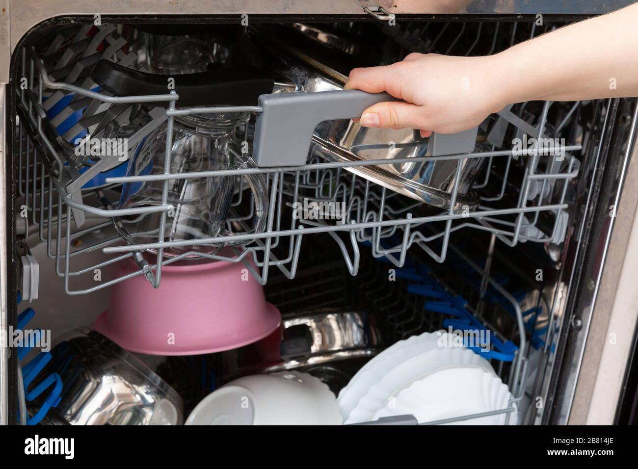 Cleaning out ceramic pot hi-res stock photography and images - Alamy