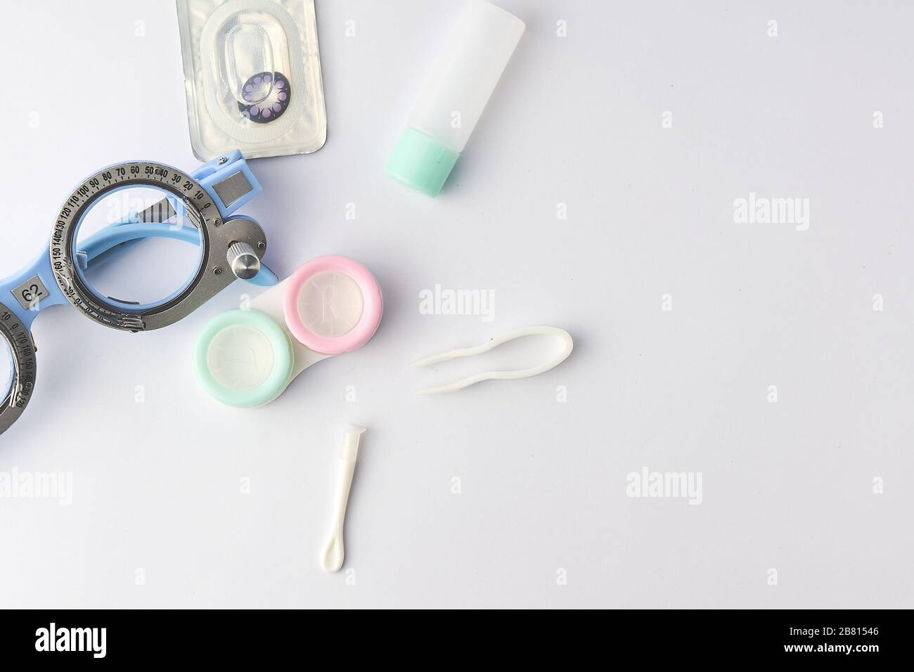Contact lens with optometrist equipment tools on white background Stock ...