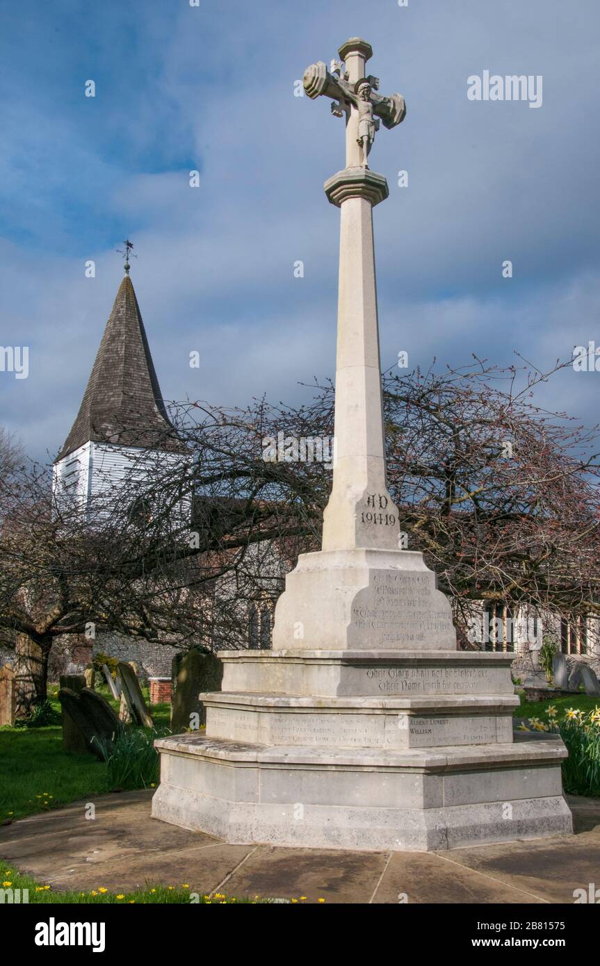 War memorial cross at the Saxon-era (ca. 1060 AD) Church of St Nicholas ...