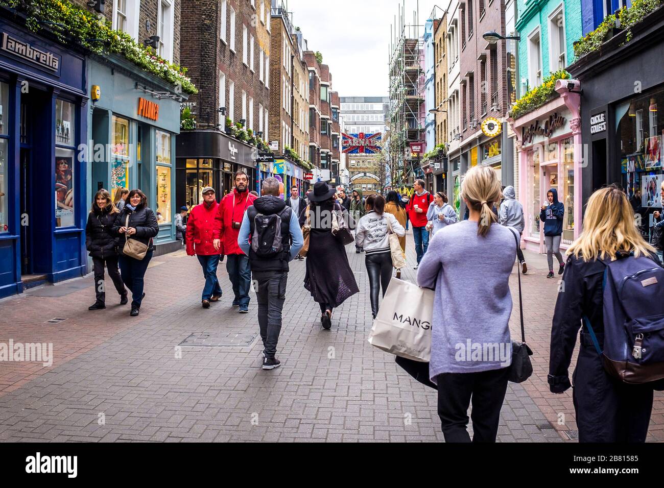 shopping in Carnaby Street , london Stock Photo - Alamy