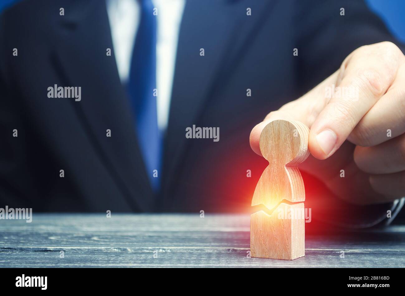 Man unites together a broken human figure. Medical healing , victory ...