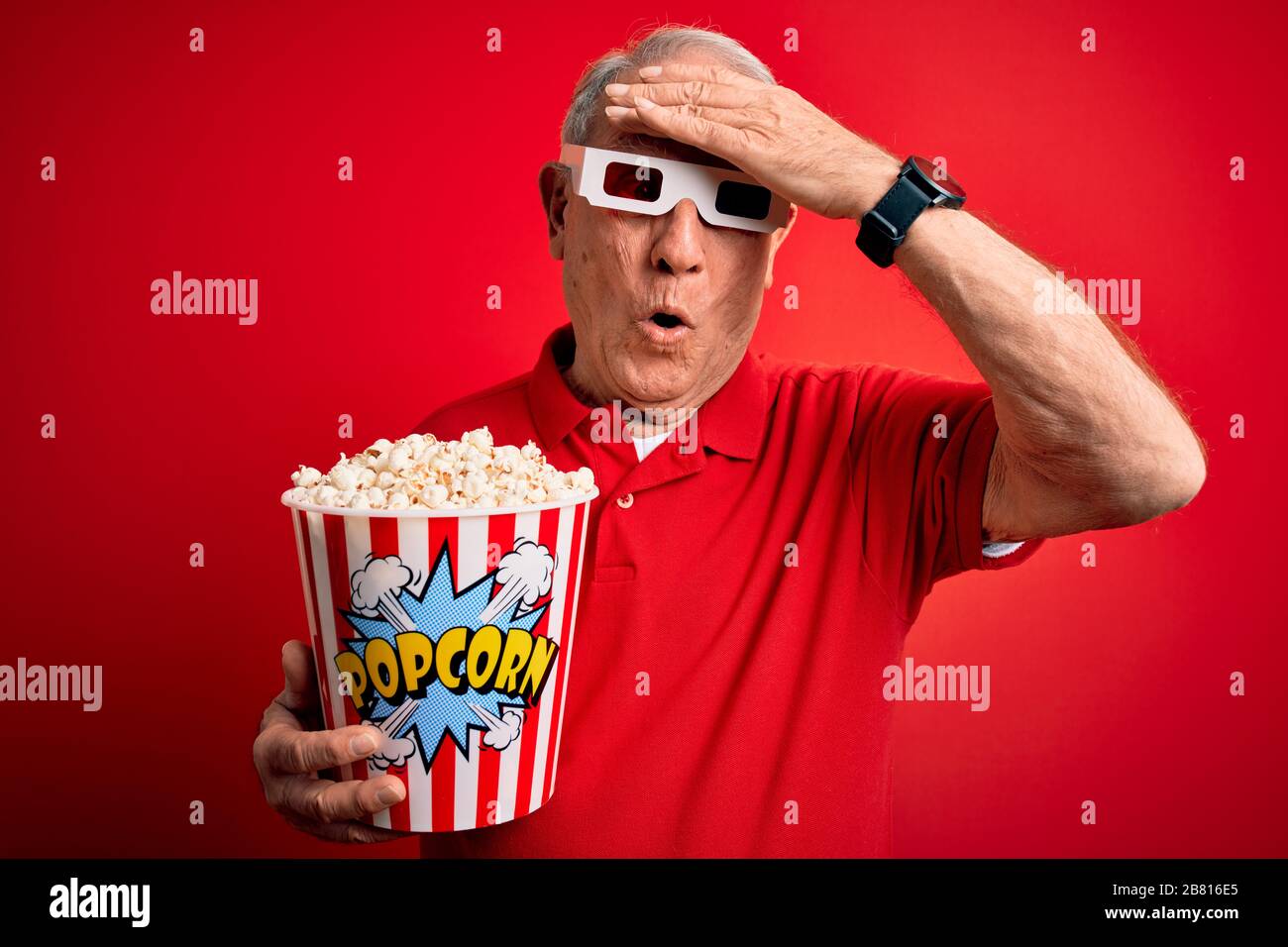 Sad man eating popcorn watching hi-res stock photography and images - Alamy