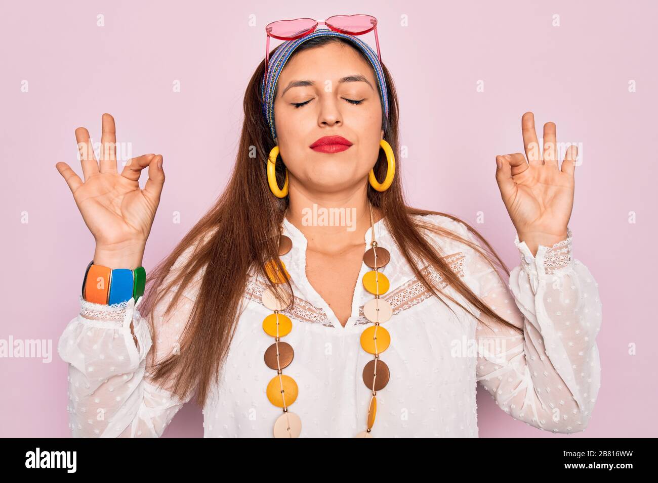 Hippy woman meditating hi-res stock photography and images - Alamy