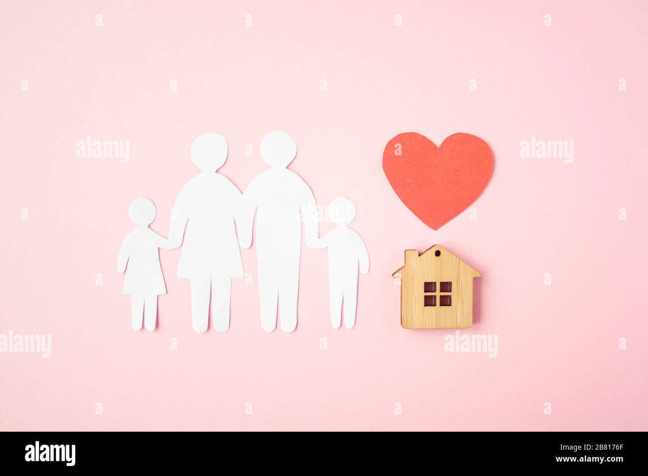 Happy paper family with house and red heart on pink background. Love ...