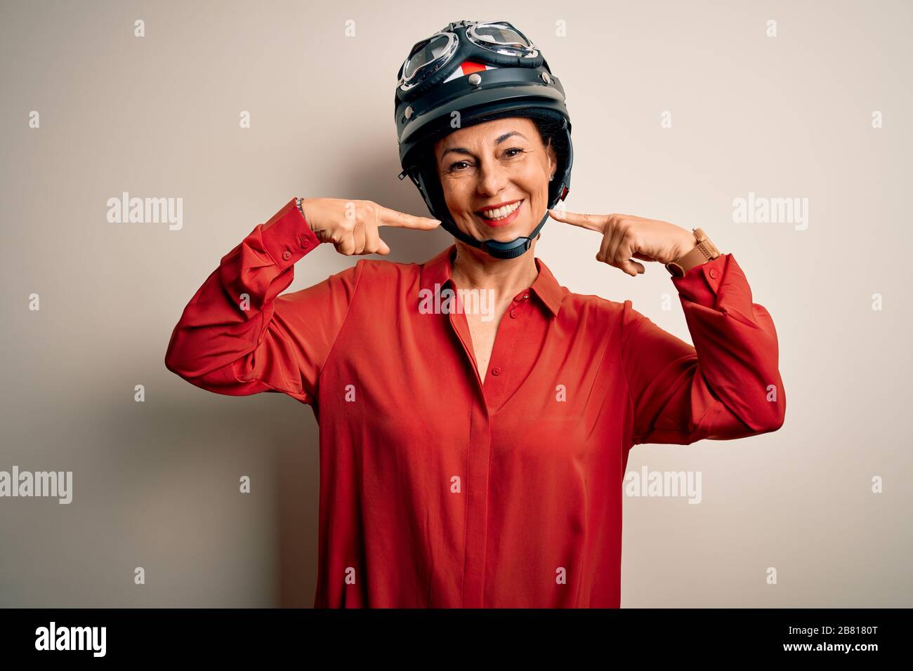 Old woman wearing helmet isolated hi-res stock photography and images ...