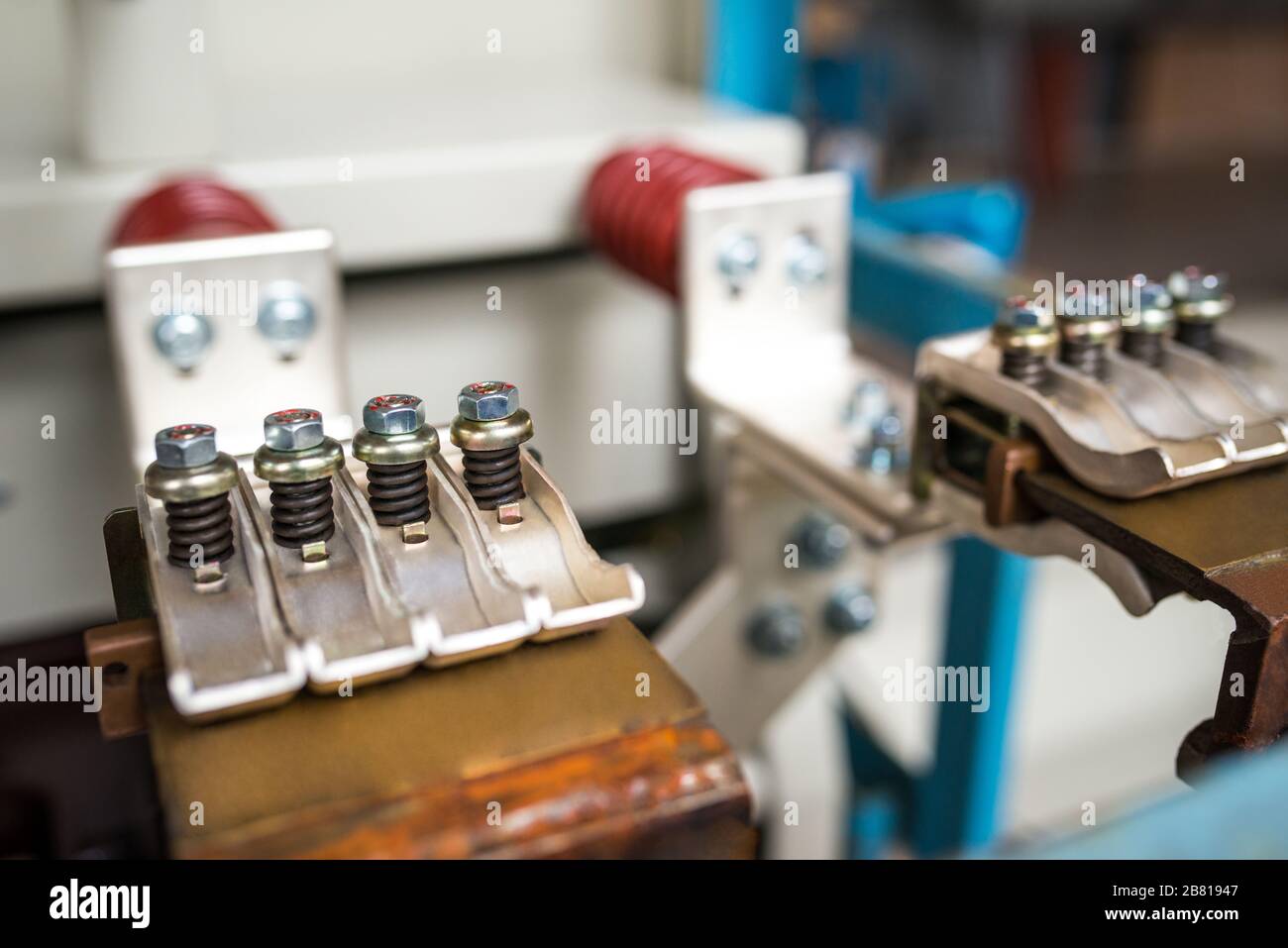 Close-up metal connections with screws and parts at an aircraft ...