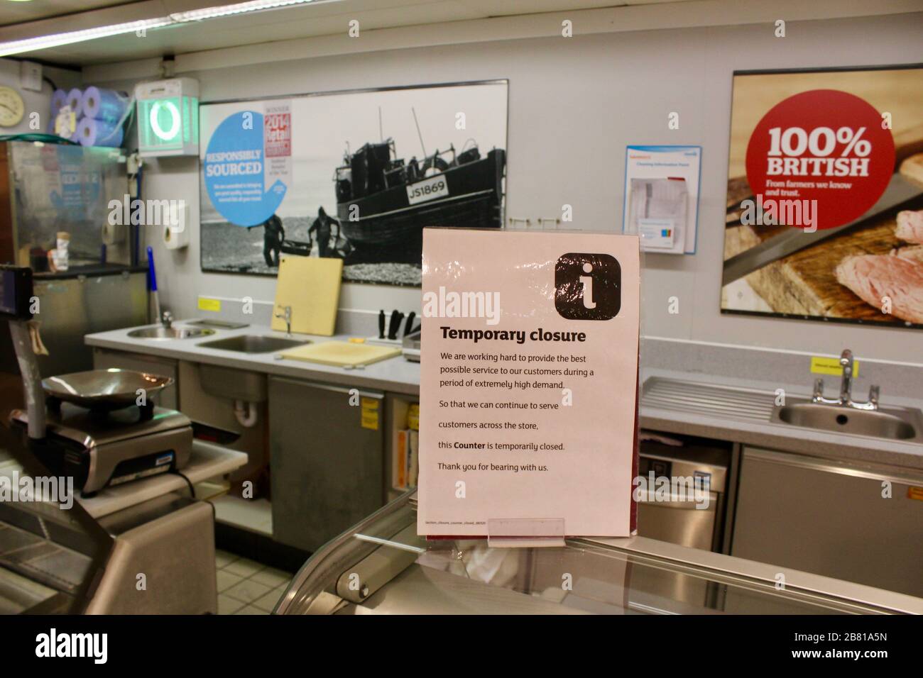 a sign announces temporary closure of meat and fish counter in ...