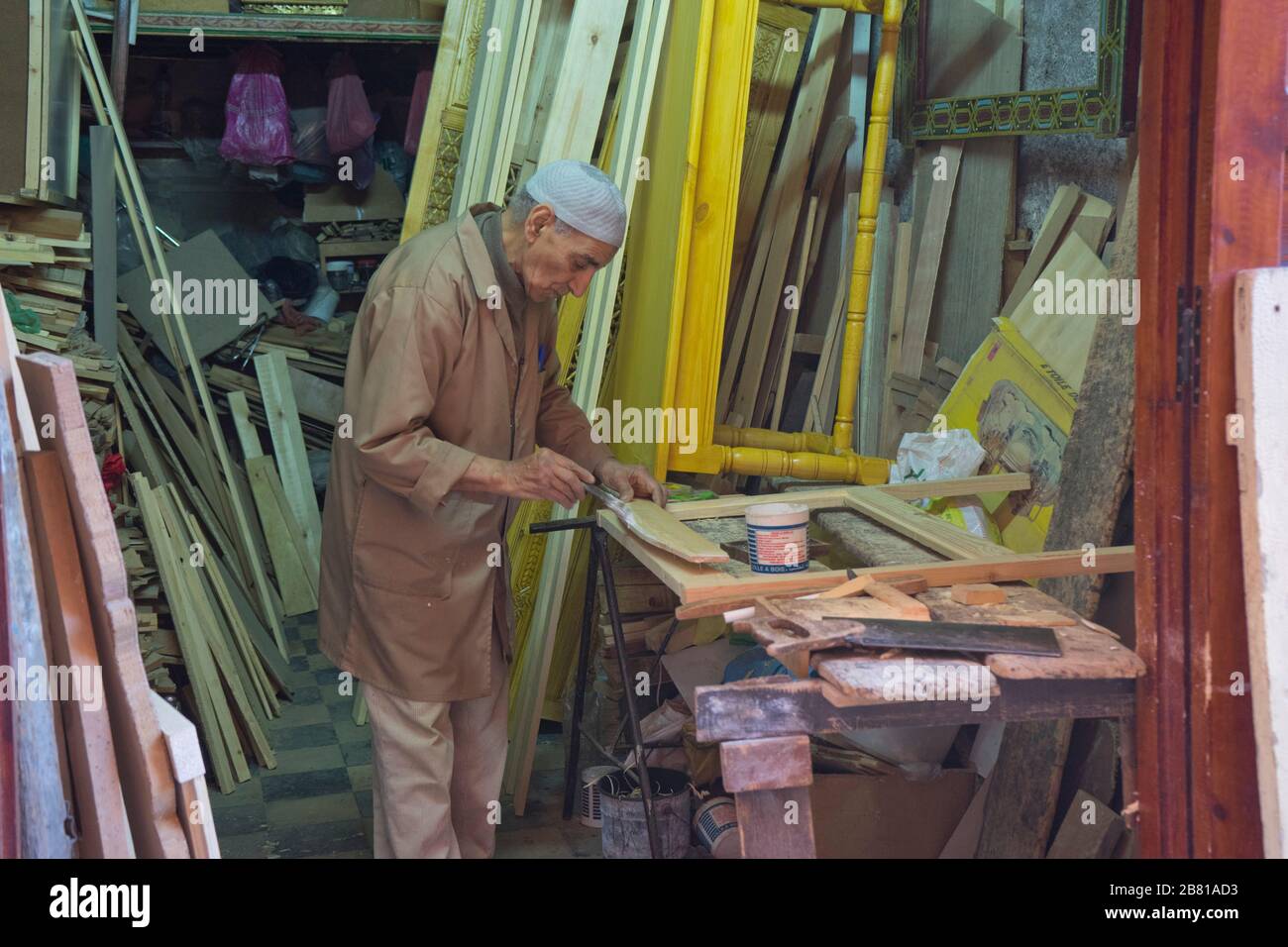 Carpenter in his workshop at the souks of the medina old town in ...