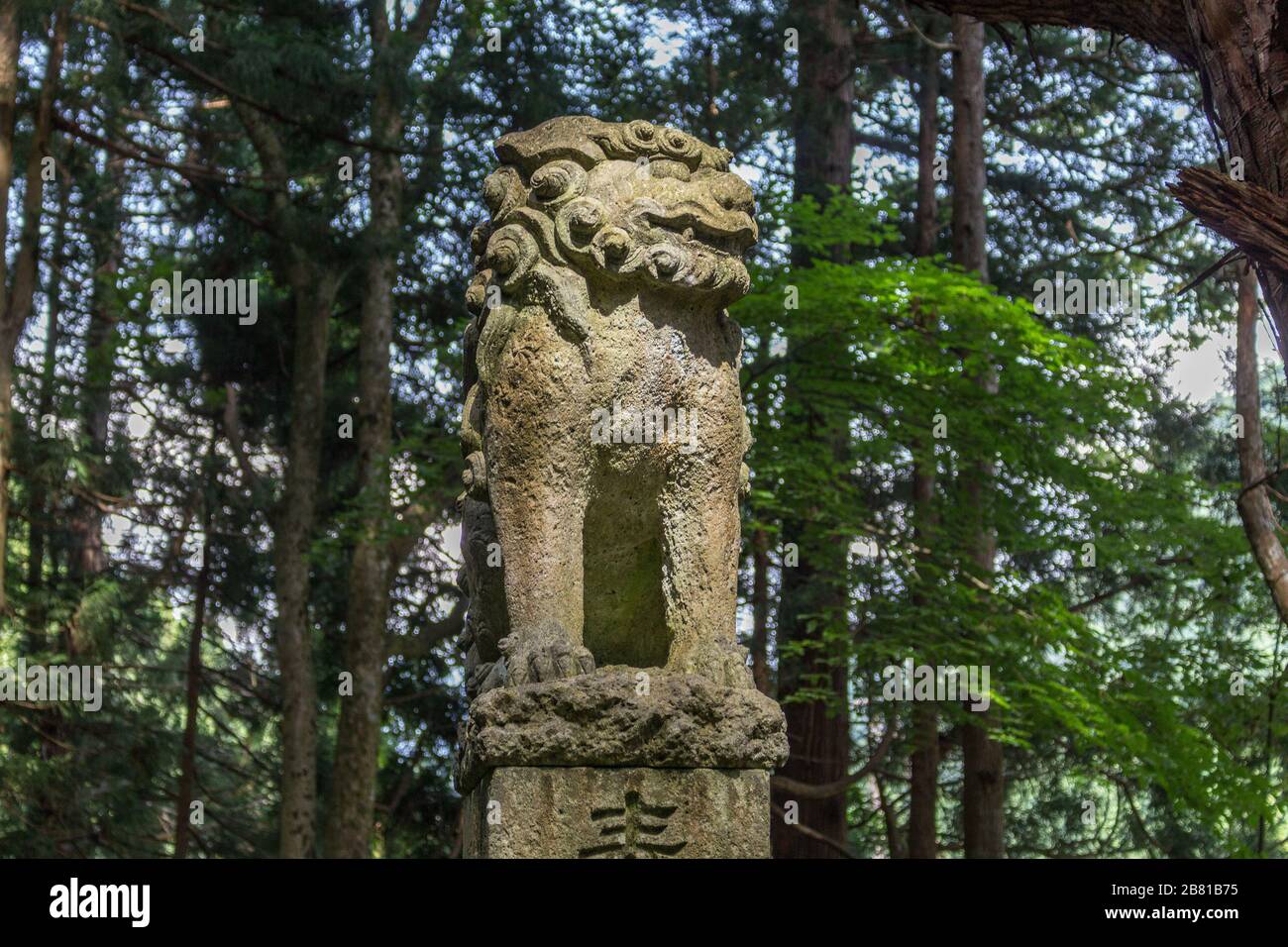 Lion-dog, or komainu, at Gojudanimachi Hachiman Shinto shrine near ...