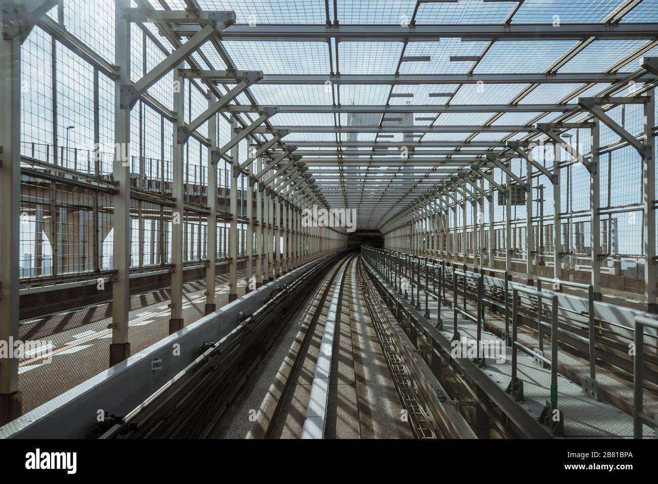 tunnel of monorail road view from front window of a moving train ...