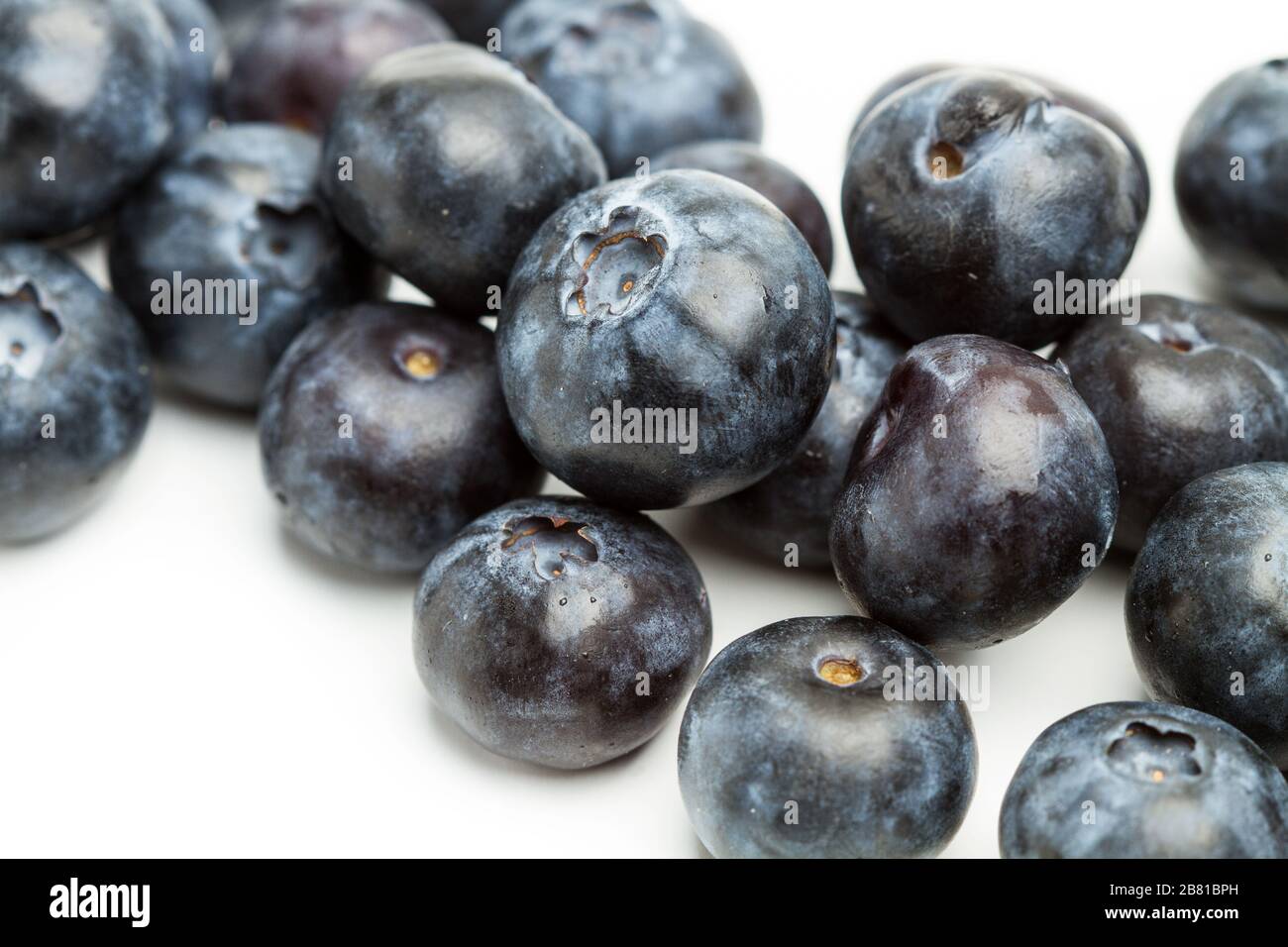 Blueberries isolated on a white background Stock Photo - Alamy